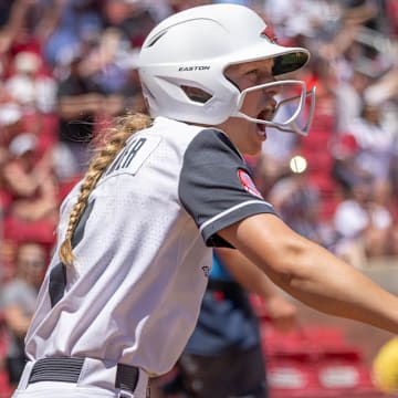 Razorbacks won't be going indoors if weather is problem Saturday