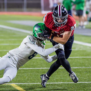 Hough sets 2025 football schedule; Huskies open vs. South Carolina ...