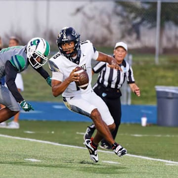 Hough sets 2025 football schedule; Huskies open vs. South Carolina ...