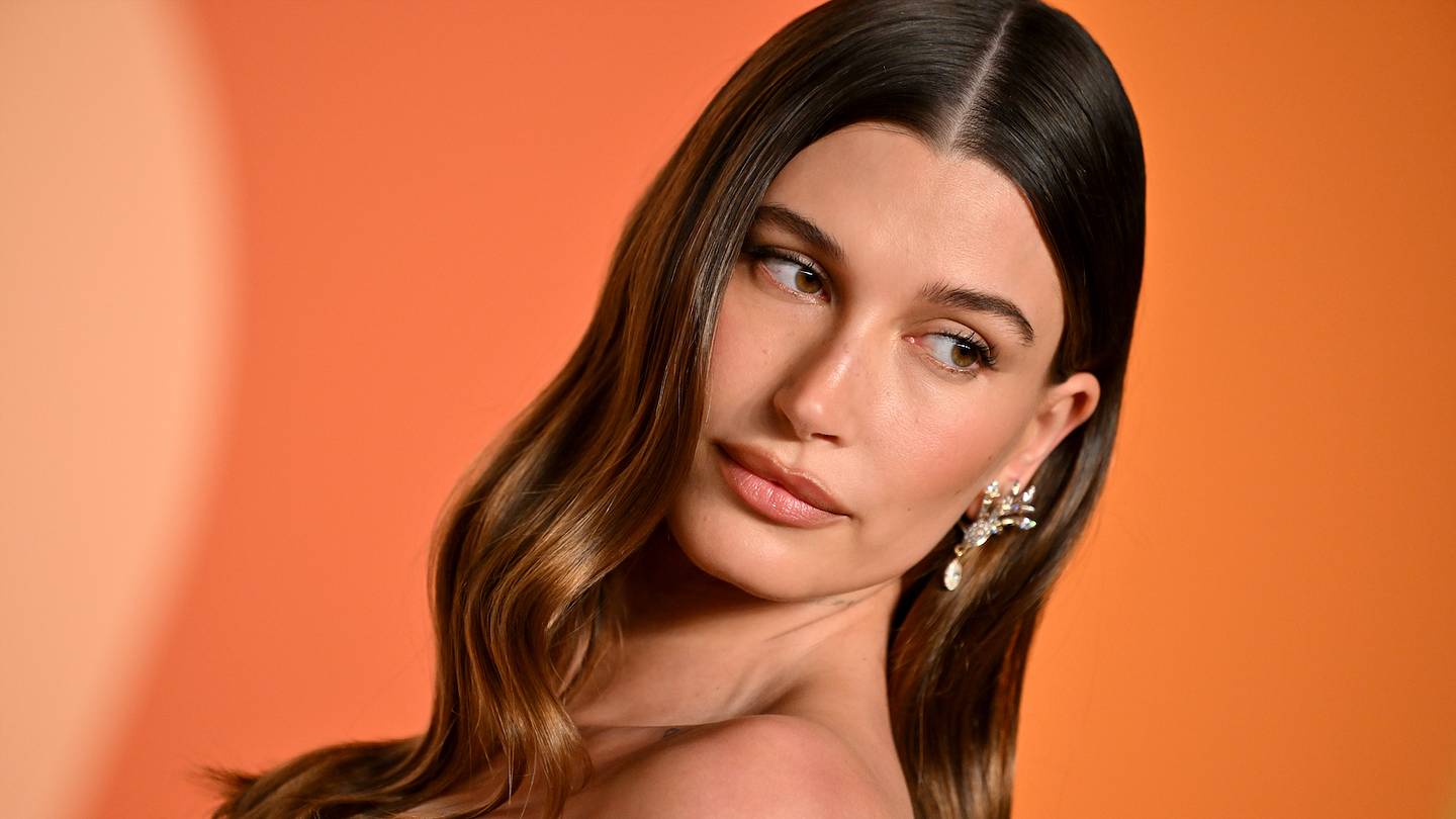 Hailey Bieber Brings Summertime Fun Into Fall With Poolside ‘GQ’ Cover