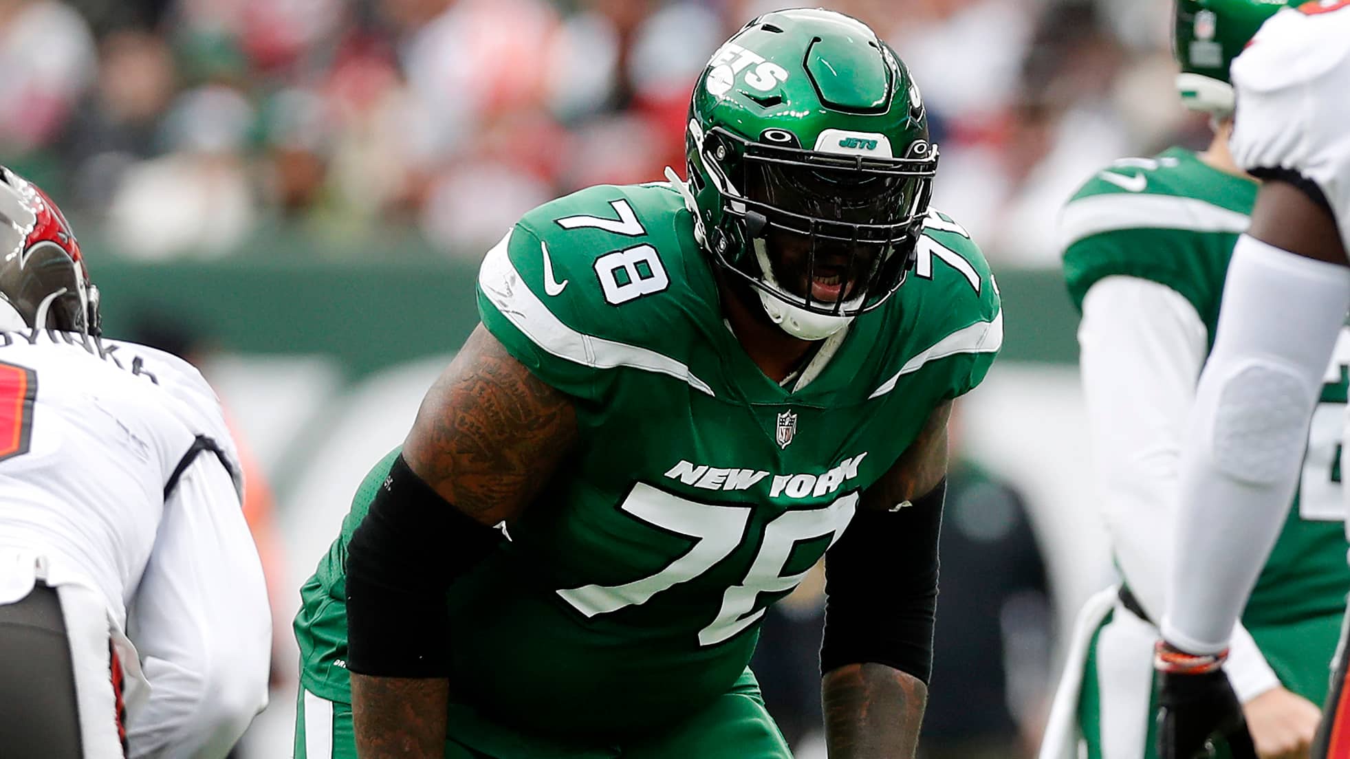 Should the NY Jets re-sign or decline OT Morgan Moses?