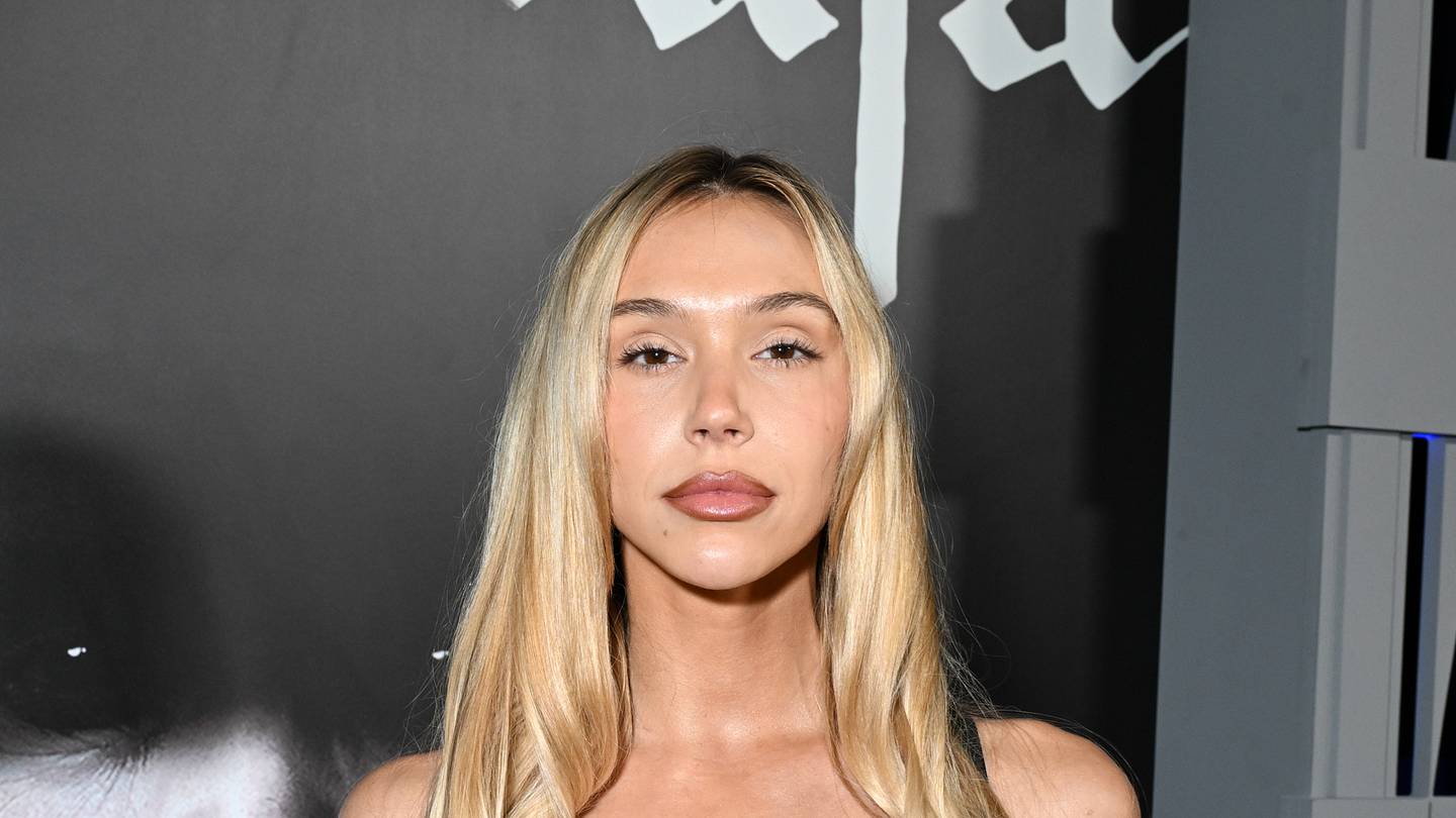Alexis Ren Is a Golden Hour Goddess in Daring Mesh Chain Micro Dress