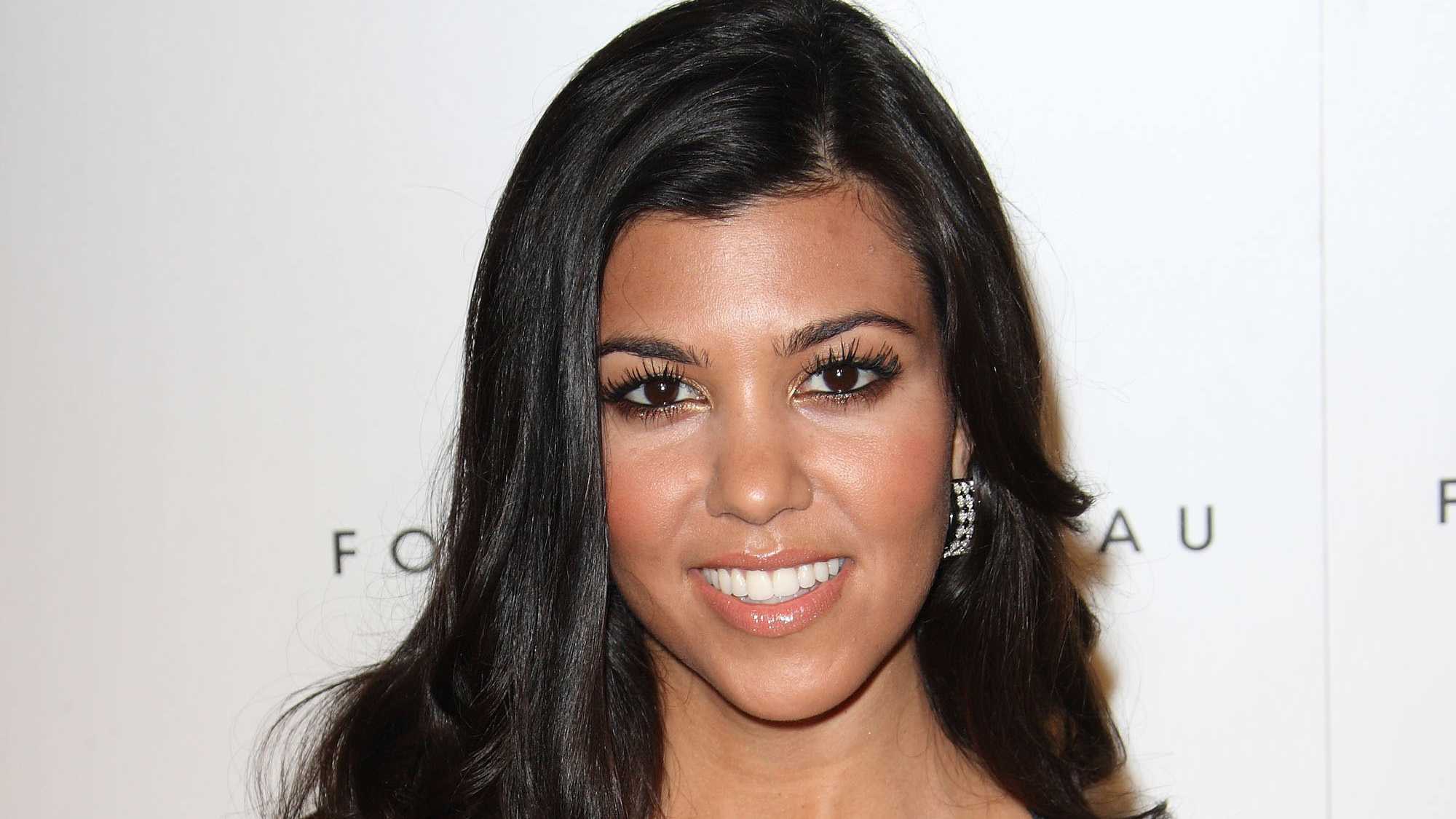 Kourtney Kardashian channels modern-day Morticia Addams: 'Dinner with ...