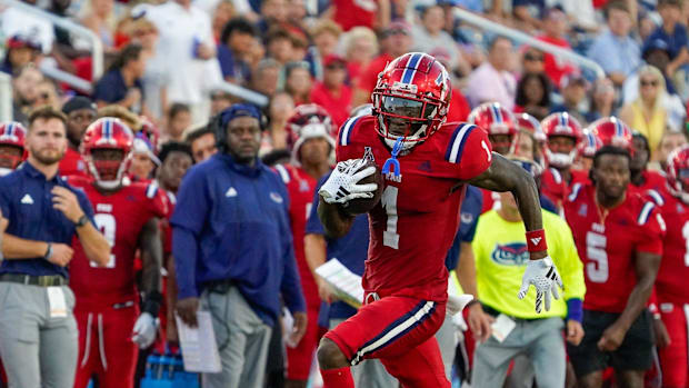 LaJohntay Wester, Coach Willie Taggart Emotional Reunion At Baltimore ...