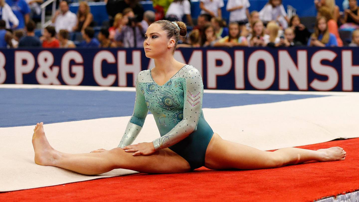 McKayla Maroney stuns in skintight leather minidress, thigh-high boots