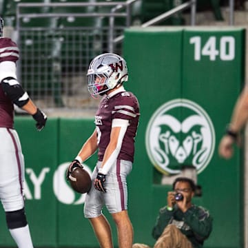 Hough sets 2025 football schedule; Huskies open vs. South Carolina ...