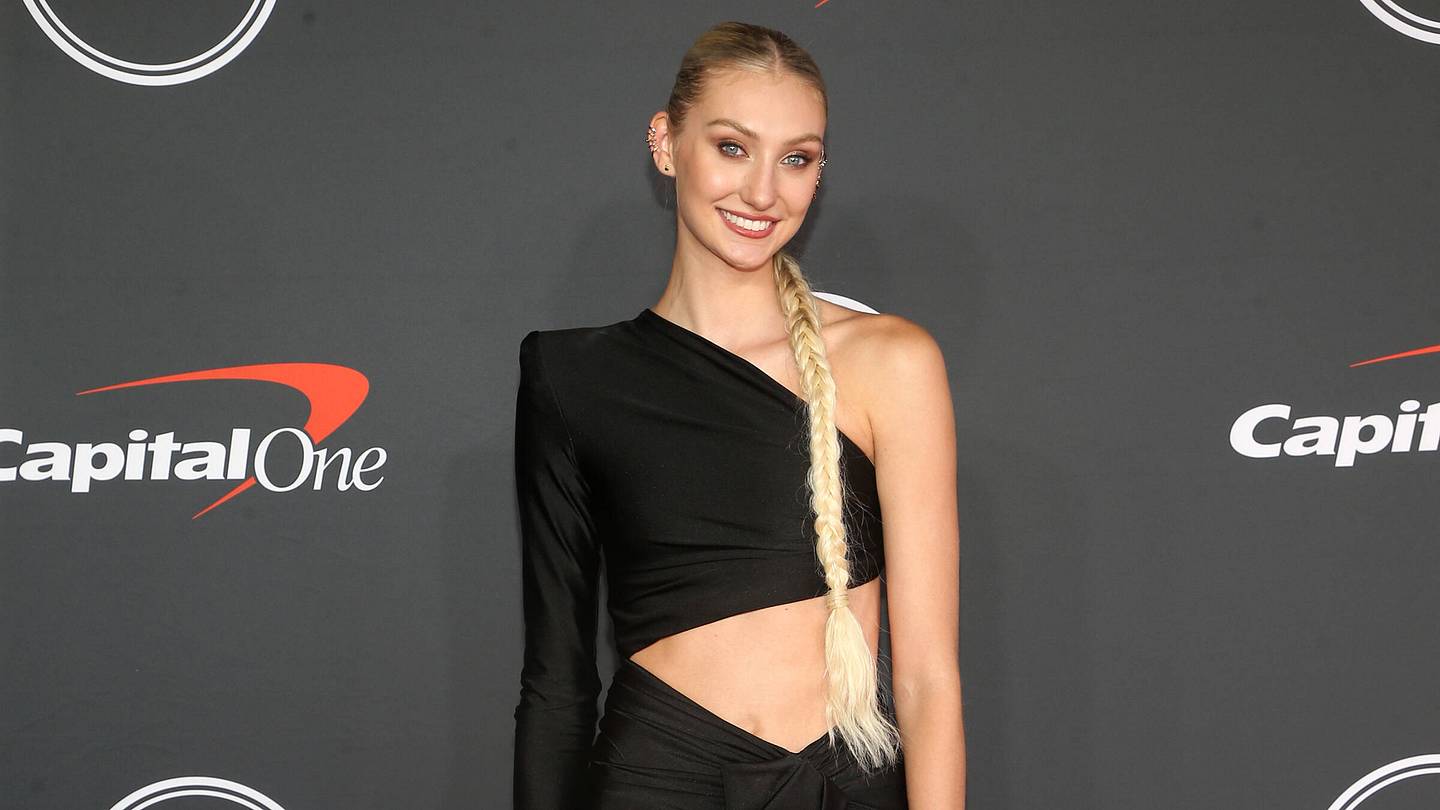 WNBA star dazzles in off-shoulder black gown for girls night out ...