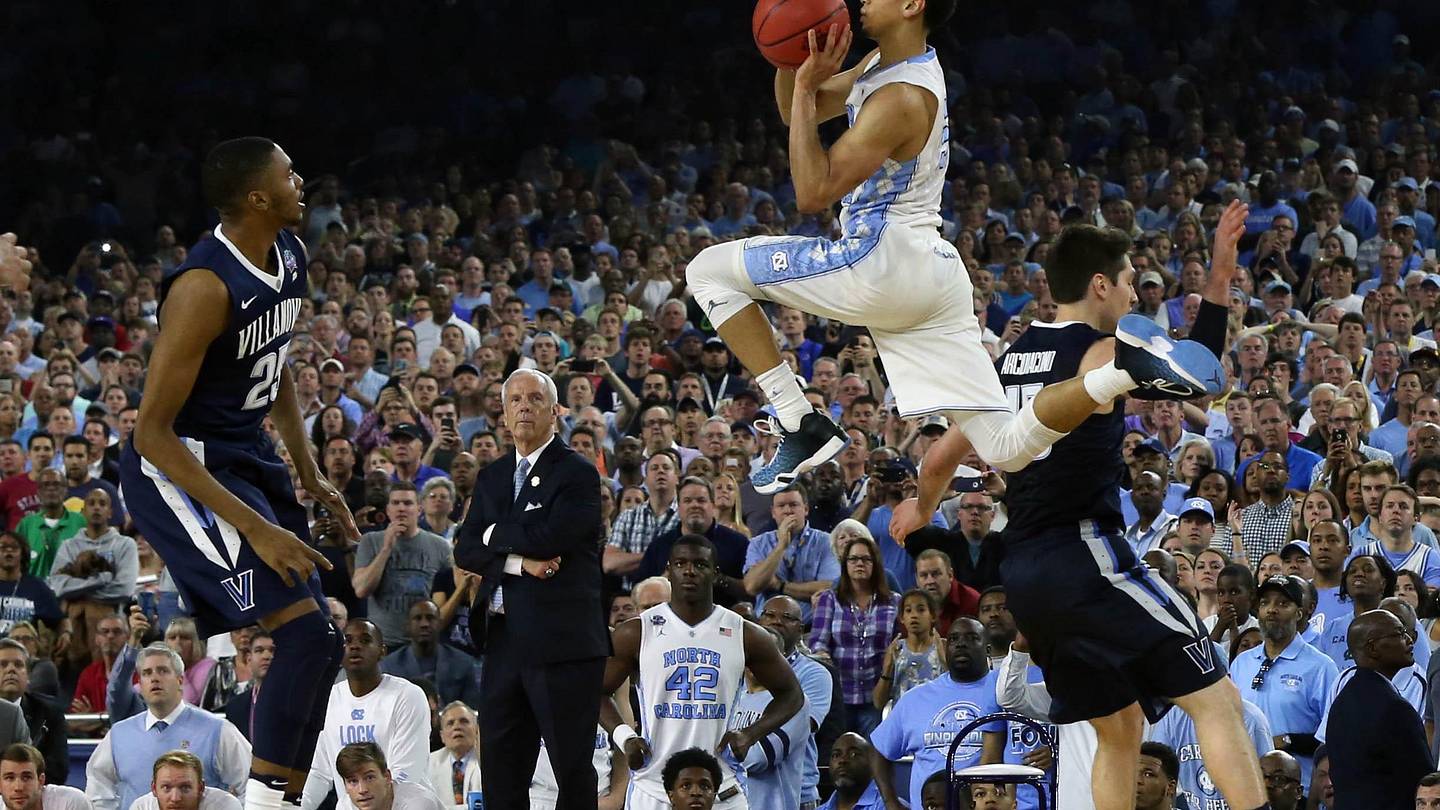 Who is Hubert Davis’ Assistant Coach Marcus Paige?