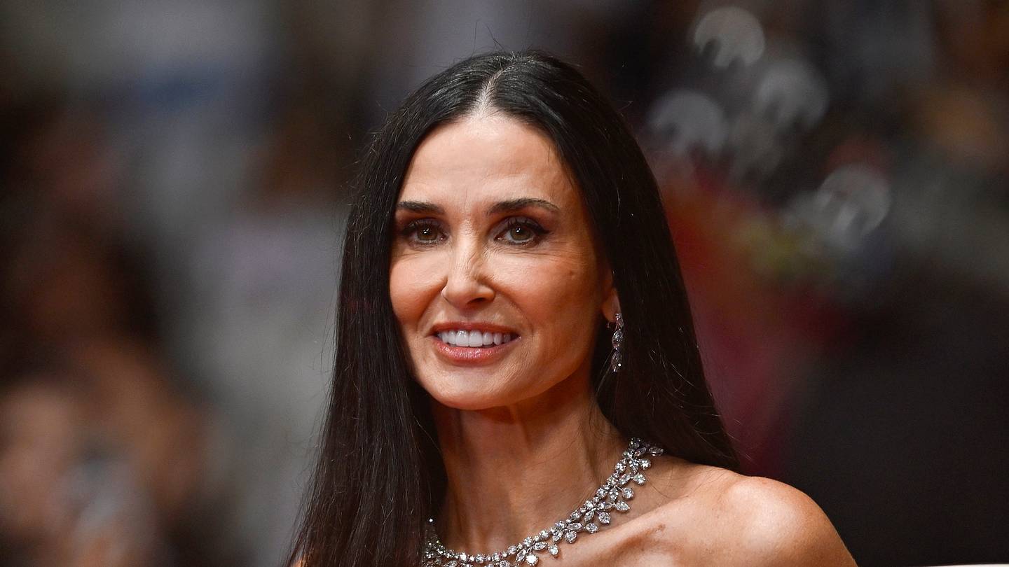 Demi Moore Flaunts Ultra-Sculpted Figure in White String Two-Piece
