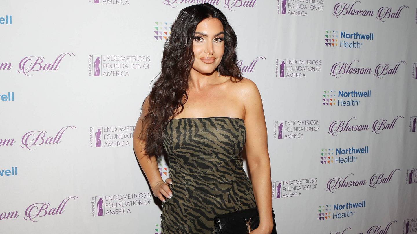 ESPN’s Molly Qerim flexes ripped-jeans fit ready for tan lines in NBA ...