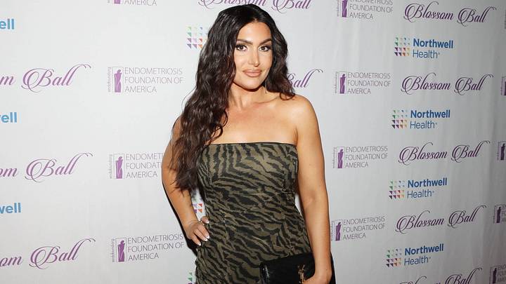 ESPN’s Molly Qerim flexes ripped-jeans fit ready for tan lines in NBA ...