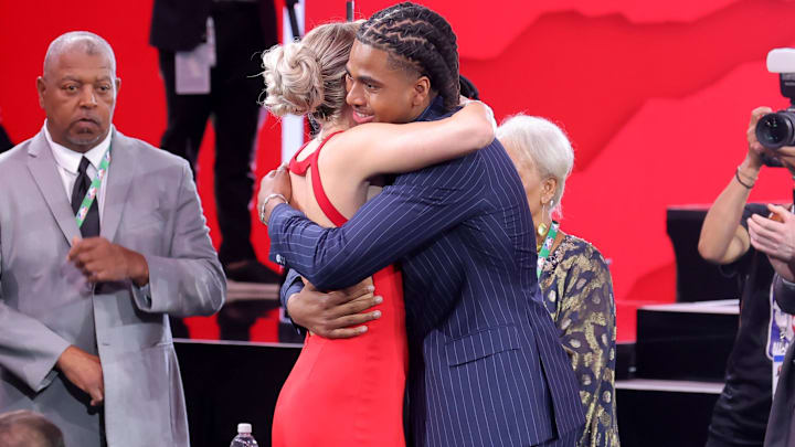 Chloe Kitts' red-dress fit steals bf Collin Murray-Boyles’ NBA draft ...