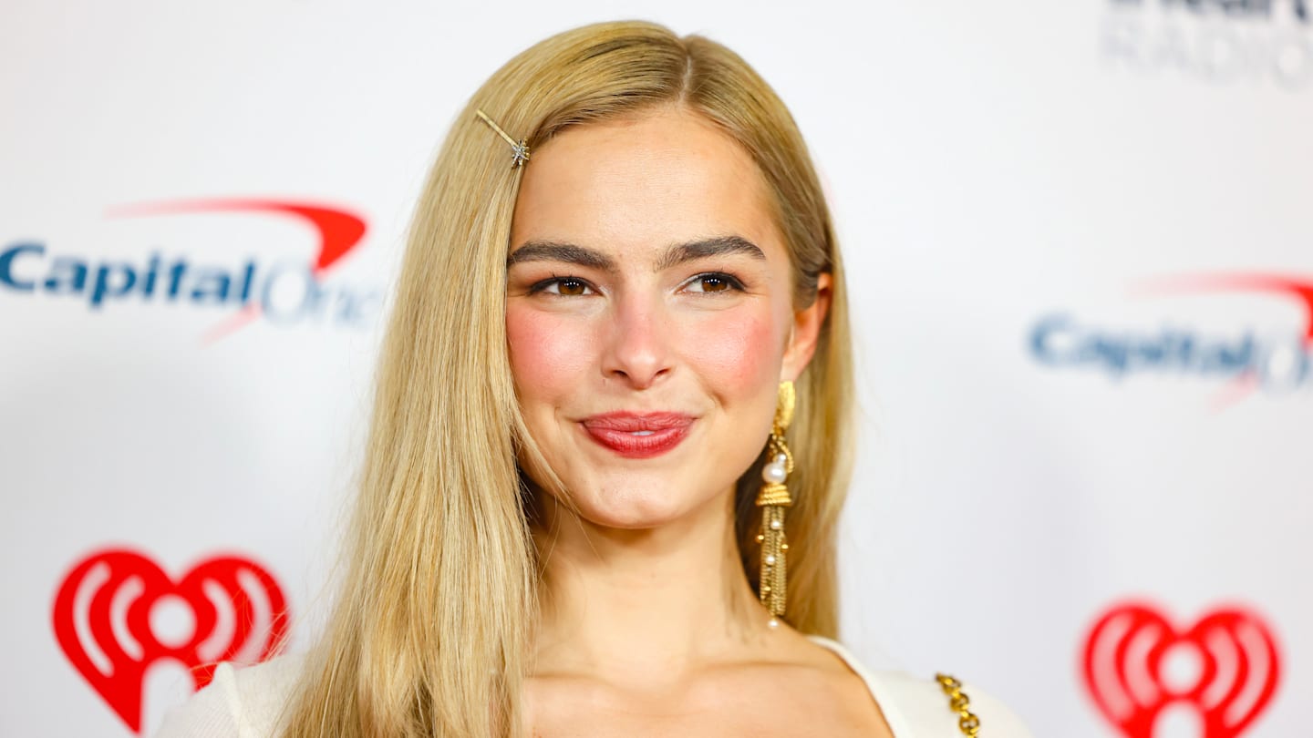 Addison Rae Channels Pop Star Alter Ego in Bold Pink Wig, Teases New Music