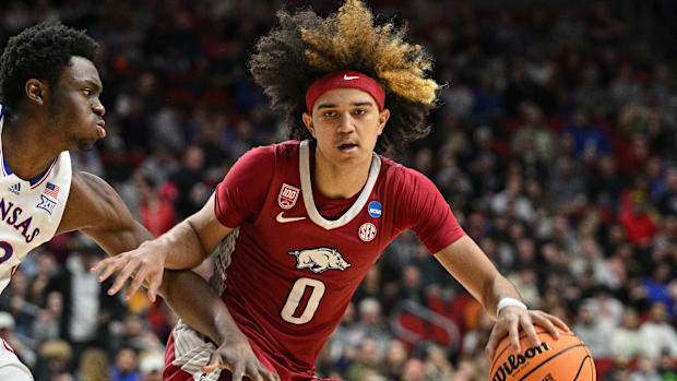 John Calipari embraces Arkansas Razorbacks stars who came before him