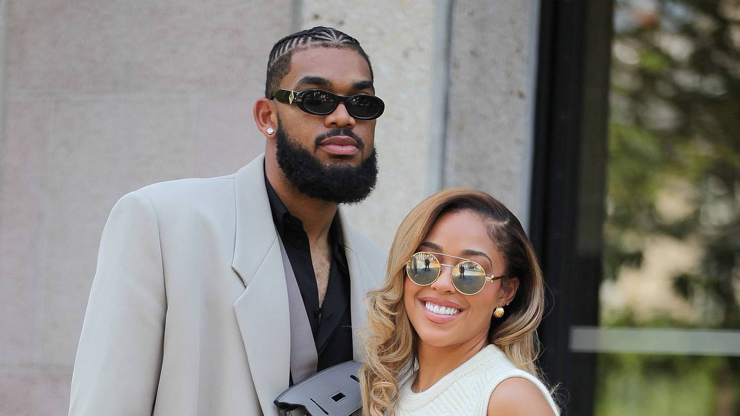 Jordyn Woods channels goddess-like energy in black dress alongside Karl ...