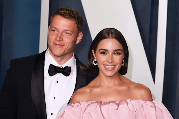 49ers star Christian McCaffrey's wife Olivia stuns in baby announcement photos