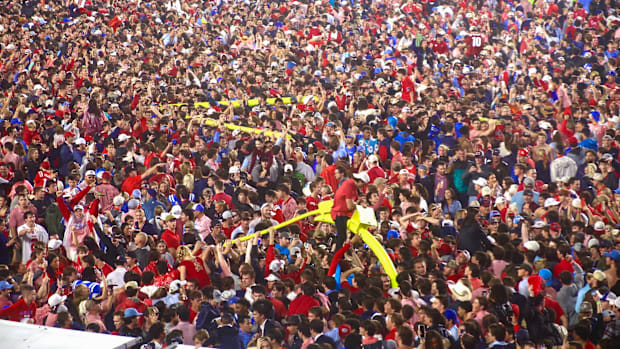 PARTY IN THE SIP: Ole Miss Fans Storm Field Following Huge Win Over Georgia