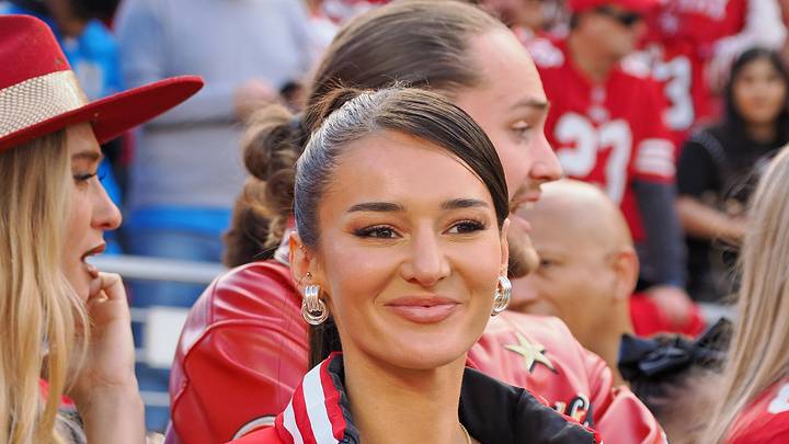 Kristin Juszczyk’s sheer top makes custom 49ers coat hard to miss