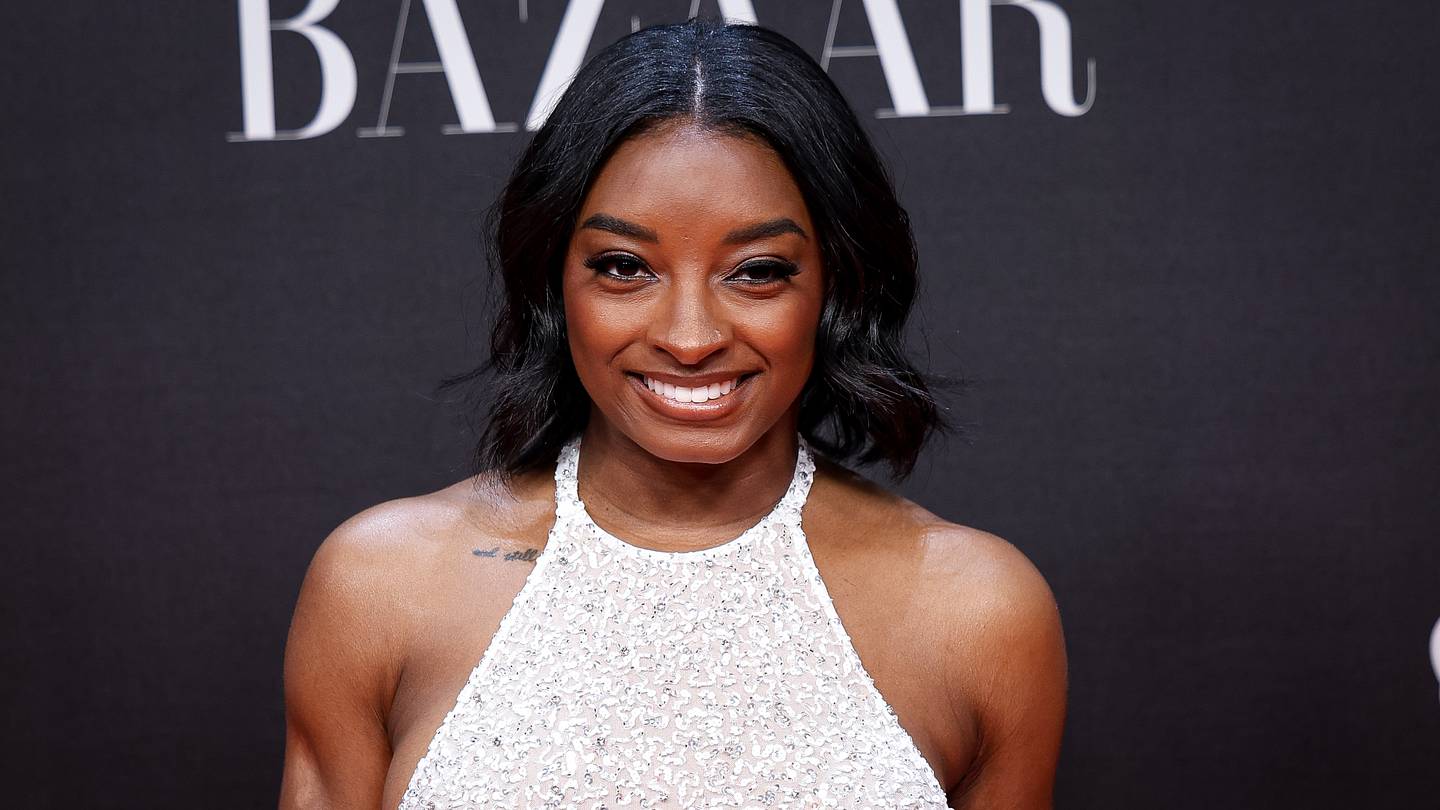 Simone Biles Makes Custom Rhinestone Sweatsuit Chic for Game Day