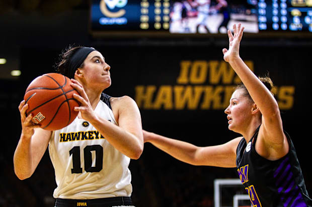 Former Iowa Hawkeyes Center Megan Gustafson Makes History