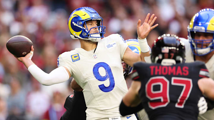 Who are the announcers and referees for the Rams vs. the Cardinals today?