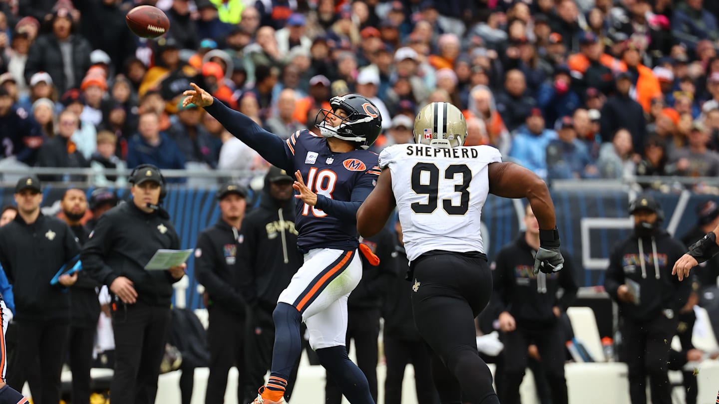 Caleb Williams grudgingly pays off lost football game 'bet' with Bears ...
