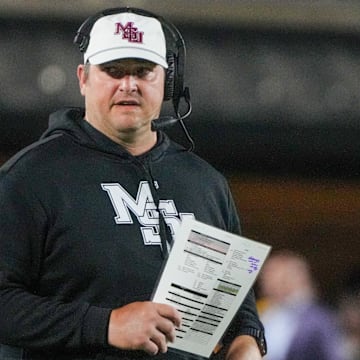 Who should be Mississippi State's starting quarterback against Ole Miss?