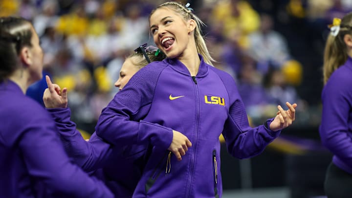 Livvy Dunne Flexes Lsu Purple Black Leotard With Stealth Tigers Sparkles In Uni