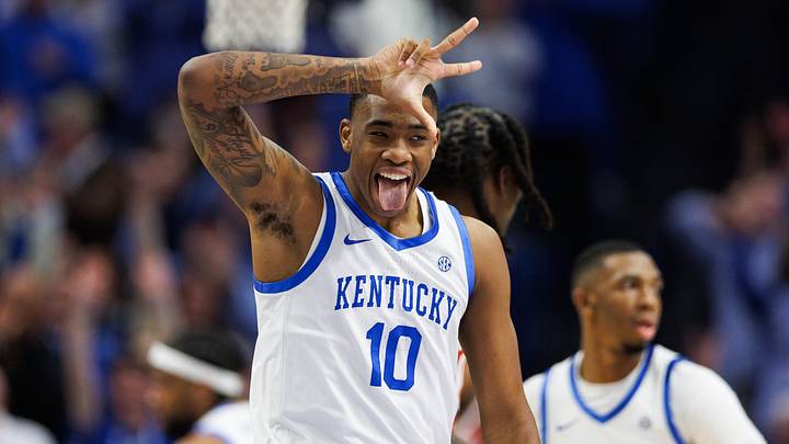 Jayden Quaintance leaning on Brandon Garrison while learning Kentucky's ...