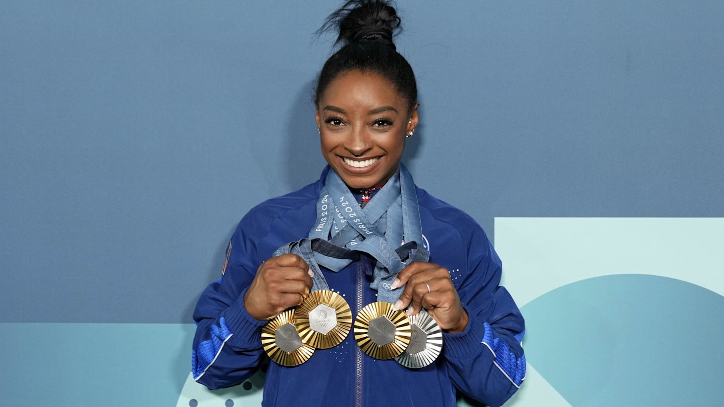 Simone Biles' GOAT pin is the holy grail of Olympic Village pin trading ...