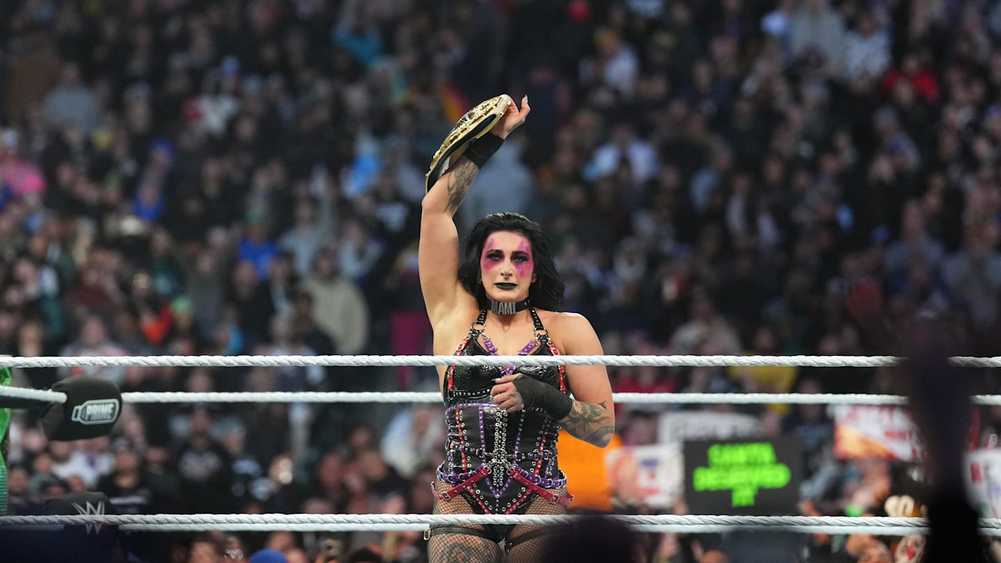 WWE's Rhea Ripley crushes 16 cans in her thighs to prepare for ...