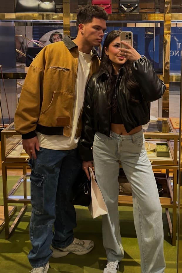 Dillon Gabriel's fianceé Zo wears ab-bearing leather jacket on ...