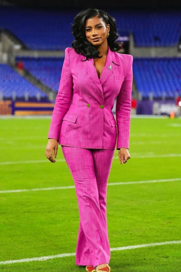 Taylor Rooks shows off latest NFL fit with WWE superstar by her side