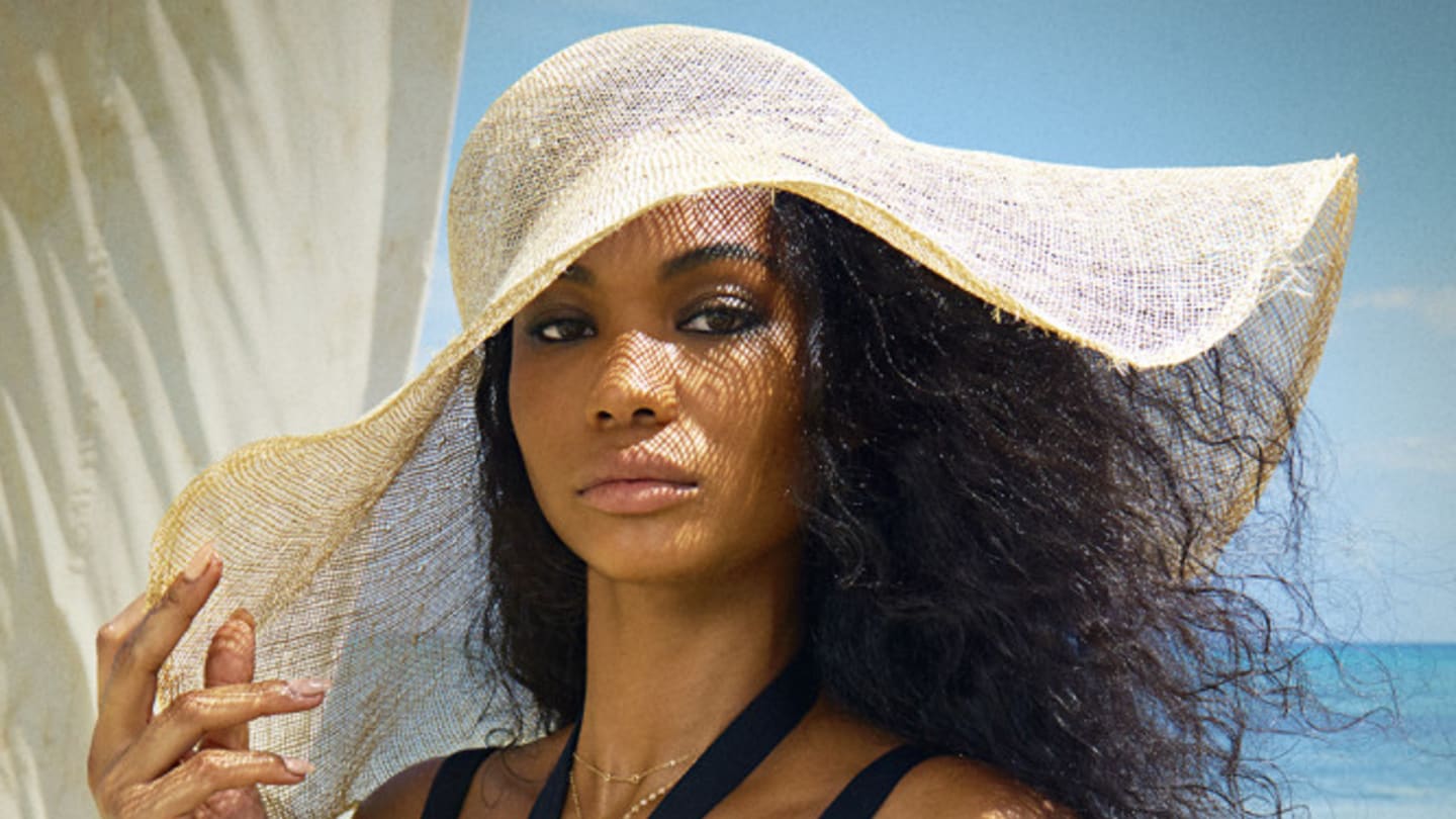 Chanel Iman Posed for SI Swimsuit With a Giant Python on the Beaches of ...