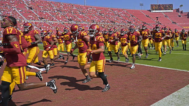 Penn State Fan Trolls USC Trojans By Running Out With The Team