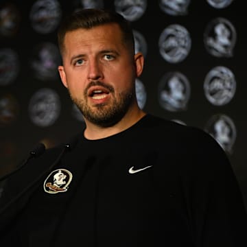 Florida State basketball coach honors late former teammate with ...