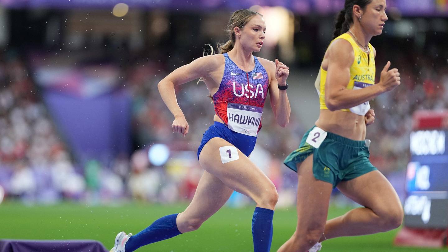 Olympic runner Chari Hawkins shows off her hottest training fits