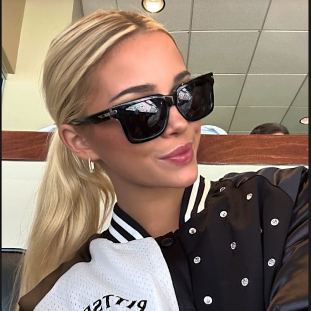 Livvy Dunne’s fire-red dress upstages boyfriend Paul Skenes’ big moment