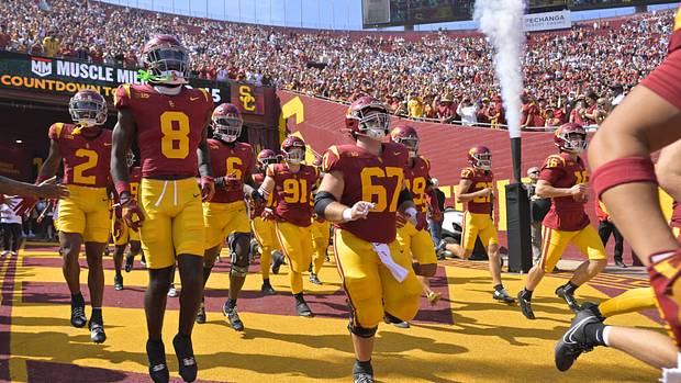 Penn State Fan Trolls USC Trojans By Running Out With The Team