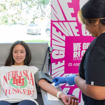 Greg Sharpe, Voice of the Huskers, Passes Away After Battling Cancer