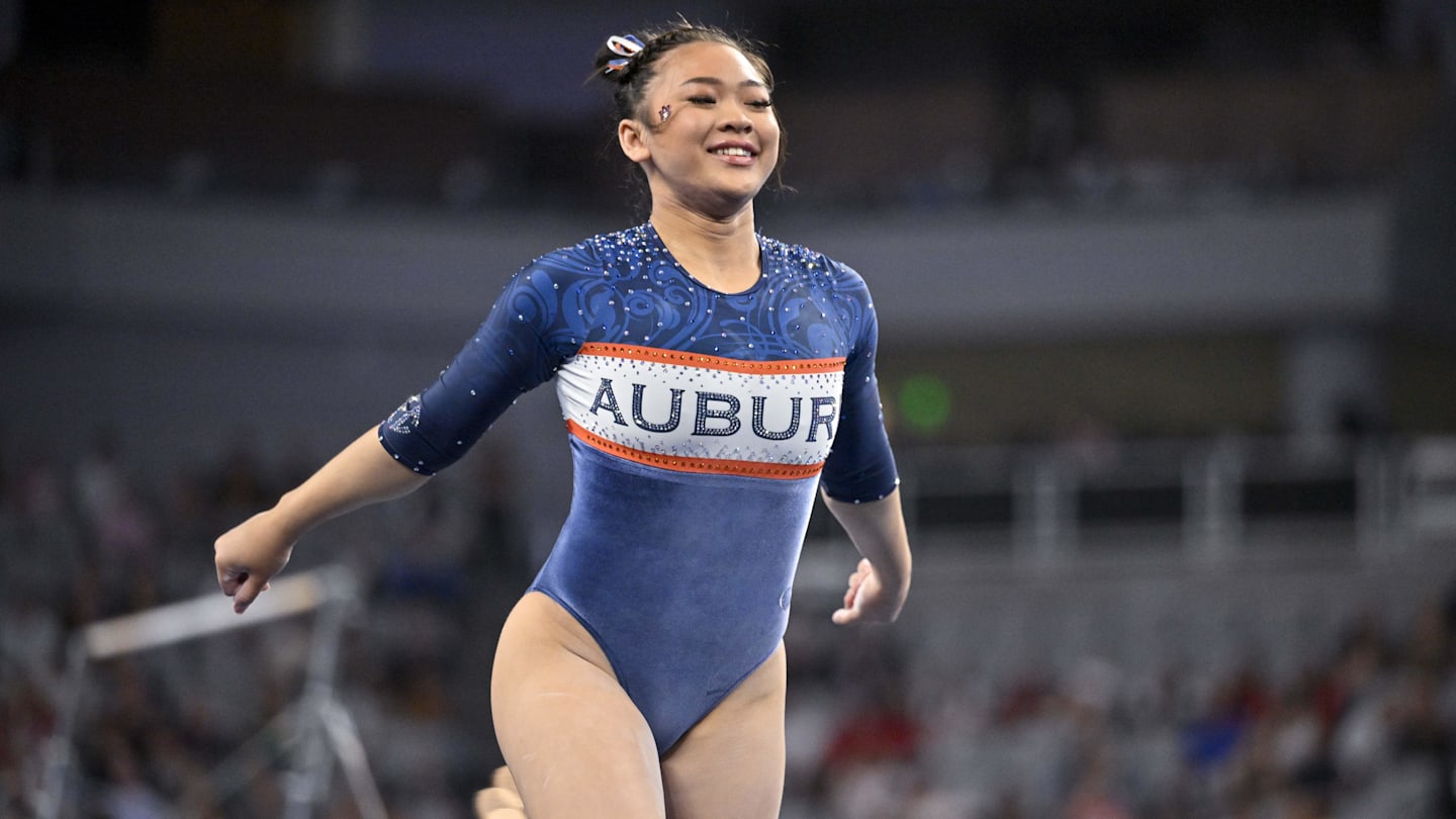 Suni Lee flexes Auburn pride in tiny black dress, jersey mirror selfie