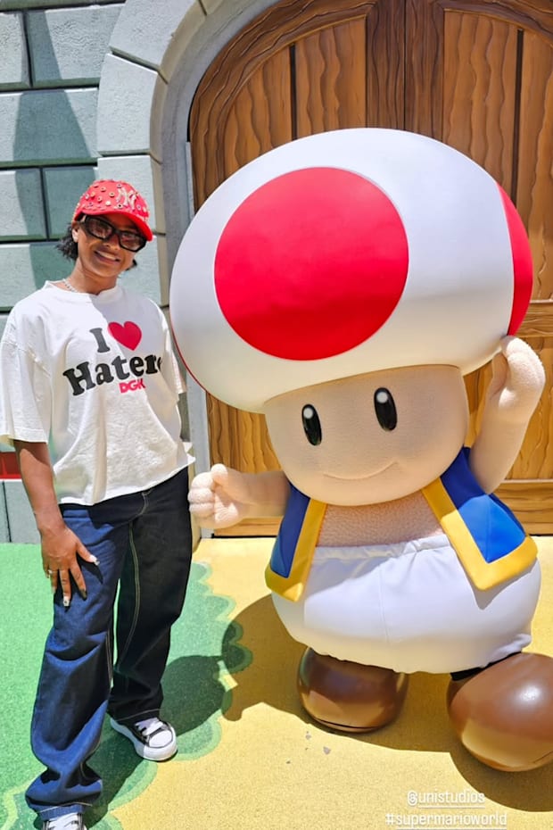 Jordan Chiles flexes new tattoo in superhero-worthy red dress for ...