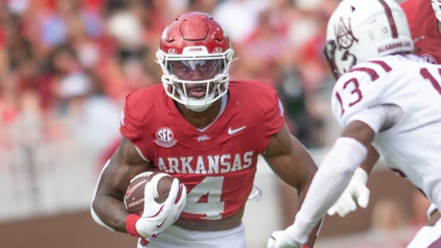 Transfer running back Mike Washington impressive in debut for Razorbacks