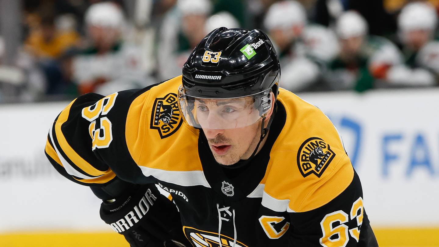 Bruins lose Brad Marchand to a scary first-period injury against Penguins