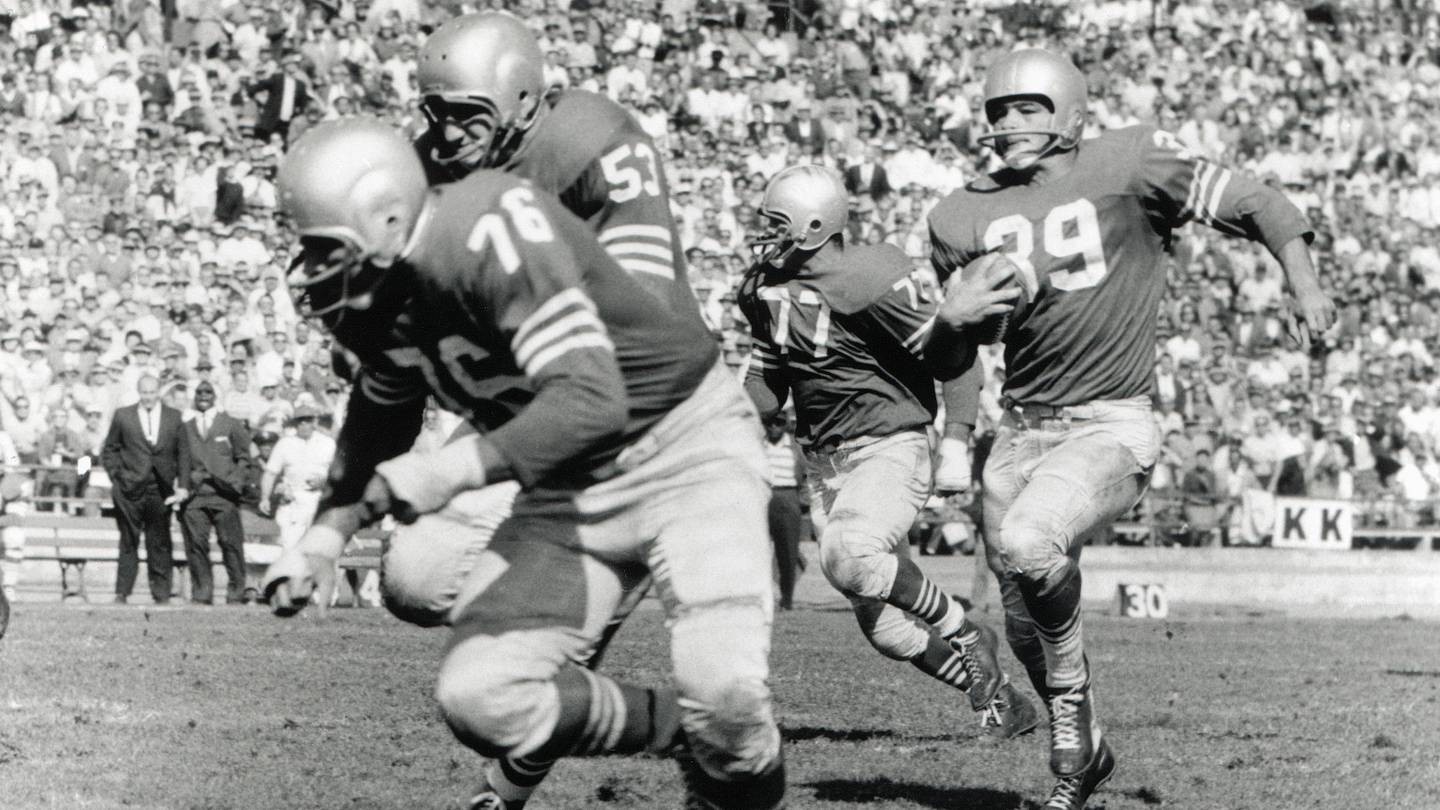 Who scored the first-ever touchdown in 49ers franchise history?