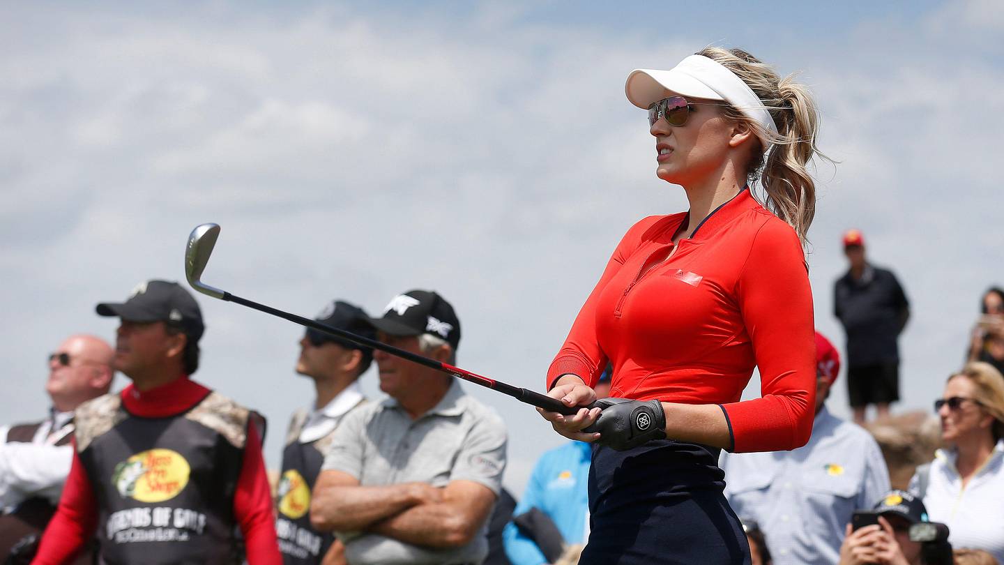Paige Spiranac spills the "2025 tea" in tan line-baring yellow cami
