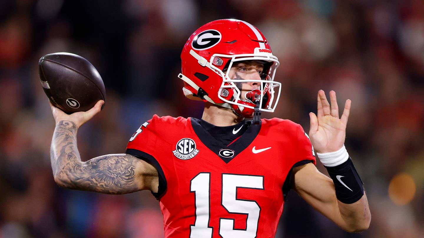 Former Georgia coach Mark Richt jokes with Carson Beck about his move ...