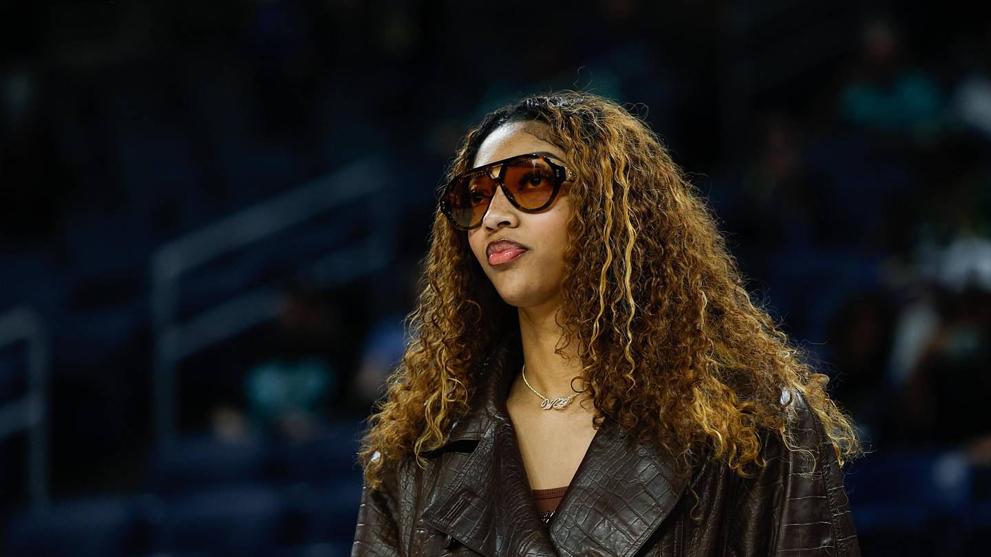 Sky's Angel Reese Reacts to WNBA Rebound Leader Trophy