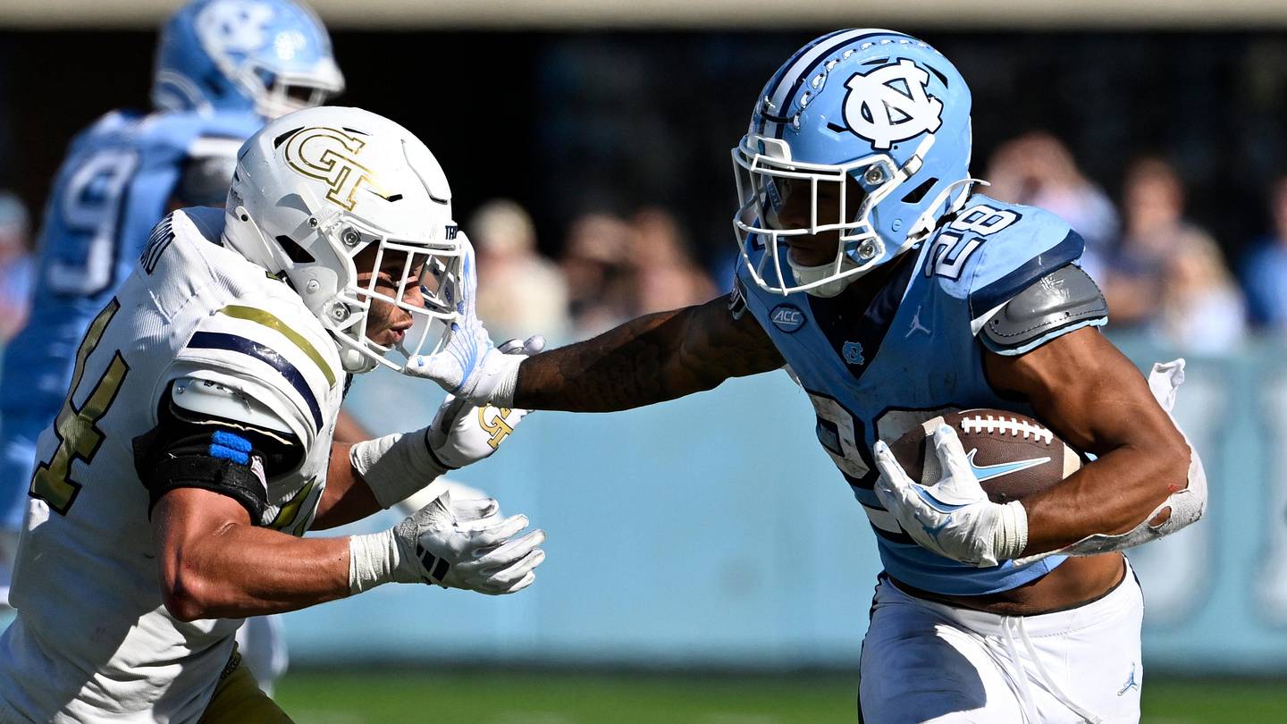 Omarion Hampton and Willie Lampkin named to Walter Camp All-America team
