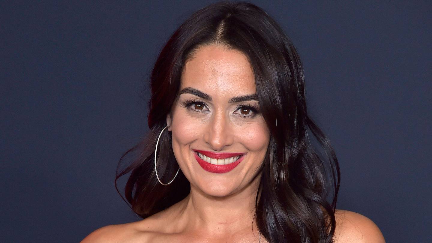 Nikki Bella causes stir in ab-revealing Cooper DeJean Eagles jersey ...